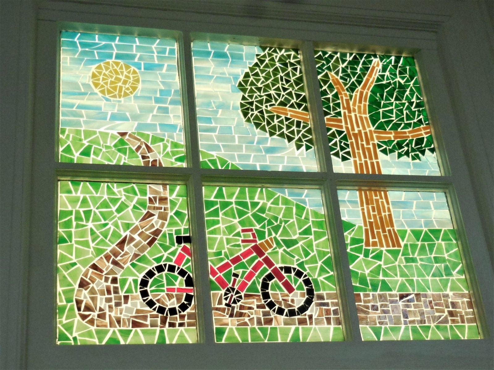 Mosaic on window in Children's library - The Westfield News